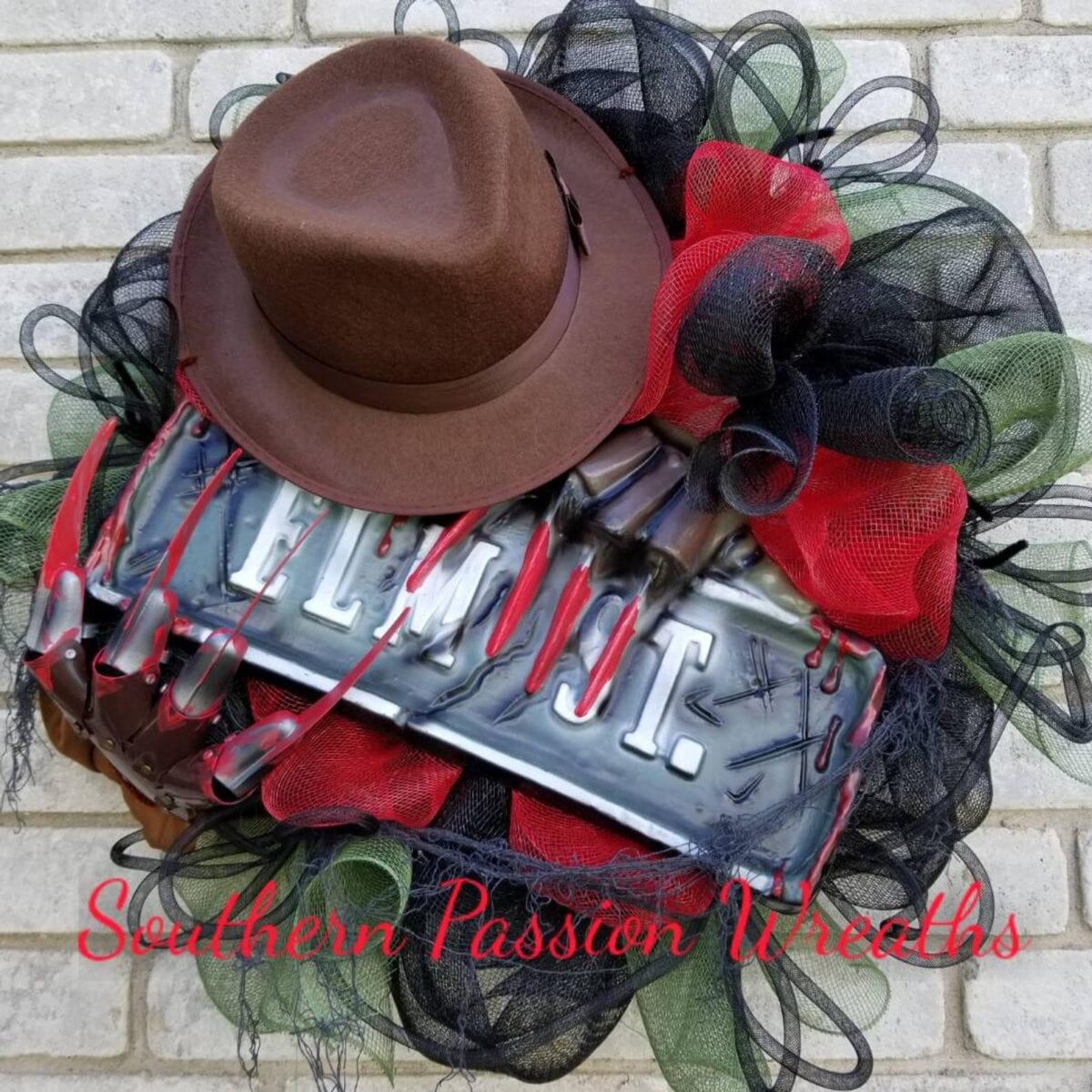 These Horror-Themed Wreaths Are The Perfect Way To Spook Up Your Home
